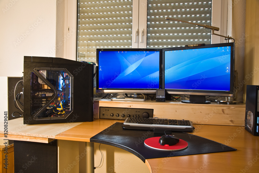 PC Personal computer with 2 flat screens, modding and picture of the ...