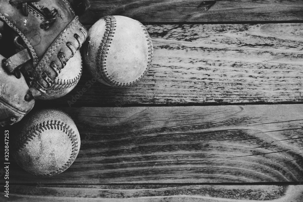 Grunge baseball background in black and white with group of balls and ...