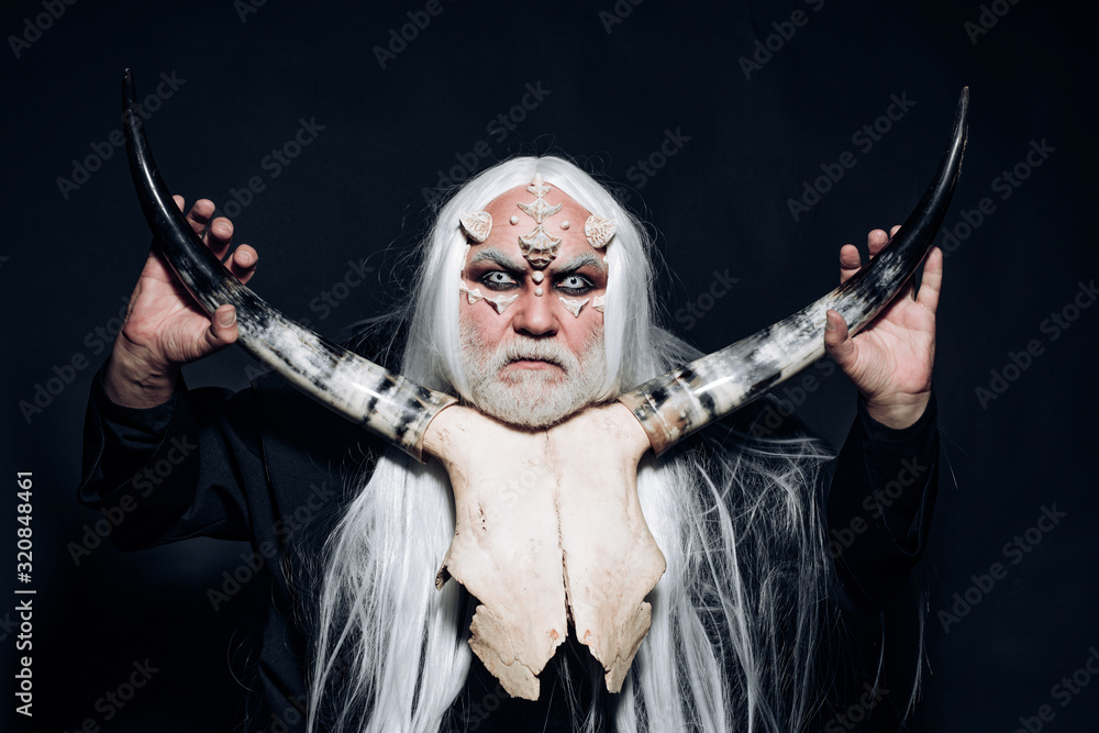 Bearded old man dressed like Halloween monster. Horror and fantasy ...