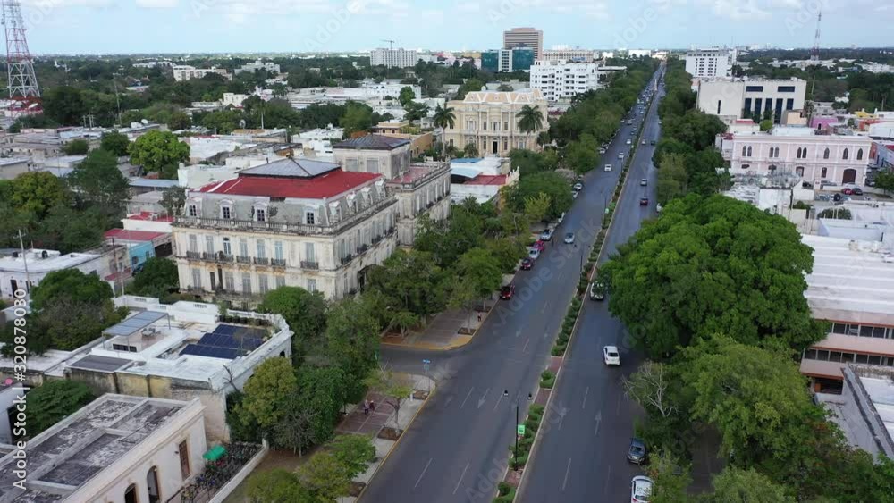 Aerial push in showing the Paseo de Montejo featuring the Palacio ...
