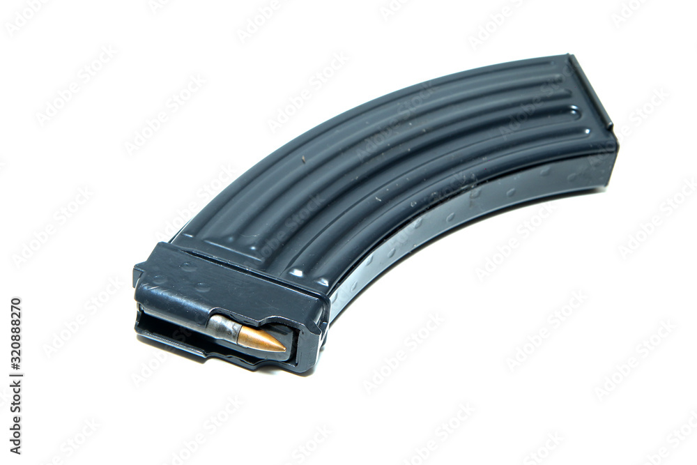 The old magazine from the soviet assault rifle with one piece of ammo ...