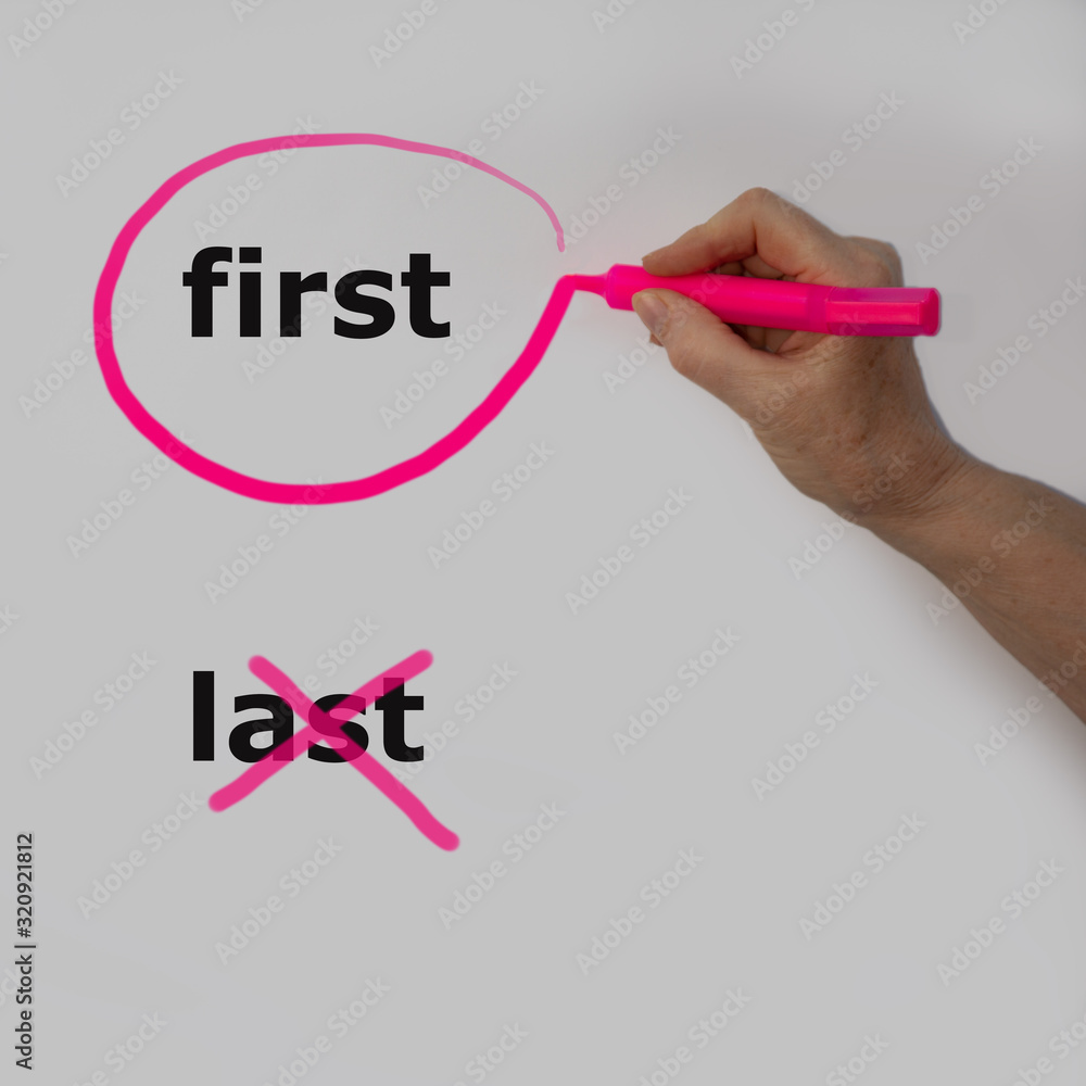The word first is circled with a pink pencil by a hand with a bubble ...