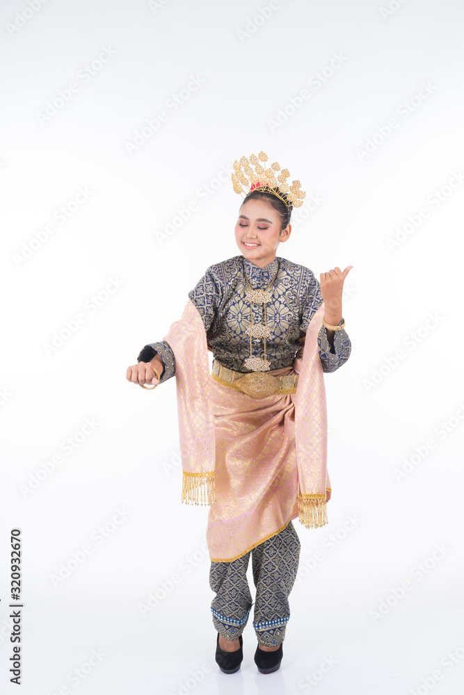 A beautiful Malaysian traditional female dancer performing a cultural ...