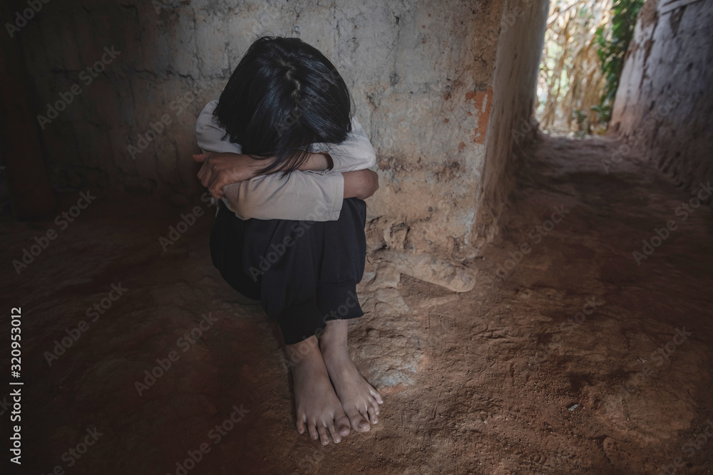 poor child sitting alone in old room.concept for bullying, depression ...