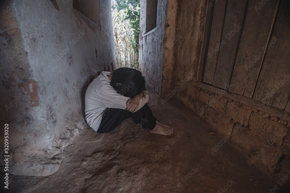 poor child sitting alone in old room.concept for bullying, depression ...