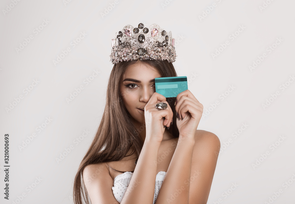 To be beautiful I need my credit card. Fashion model woman pretty girl ...