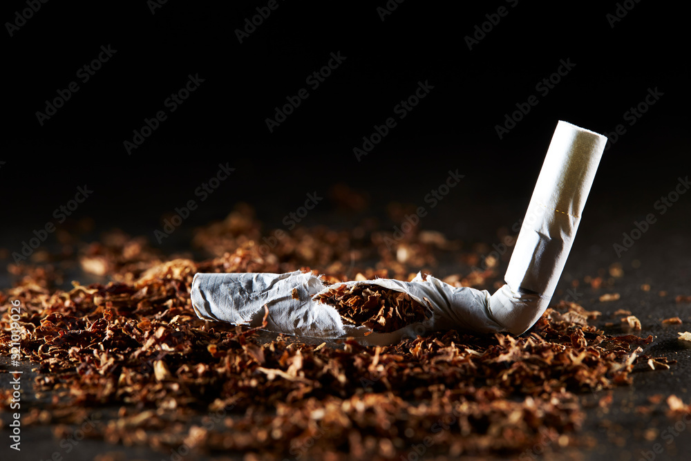 Cigarette background with lighting, studio shot Stock Photo | Adobe Stock