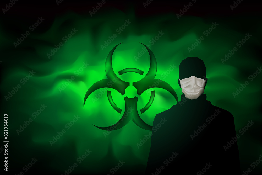 A man in a mask against the background of a biohazard sign and a ...