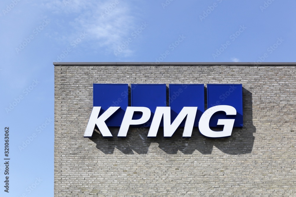 Foto de Tilst, Denmark - August 8, 2015: KPMG logo on a facade. KPMG is ...