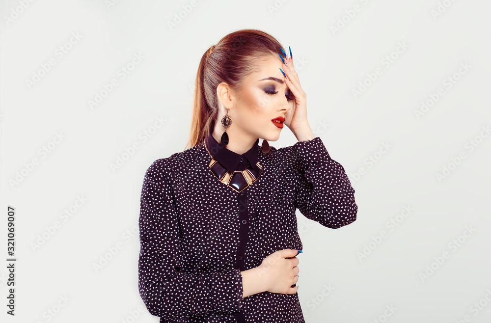 Sadness. Closeup portrait young stylish woman sad, hand on face looking ...