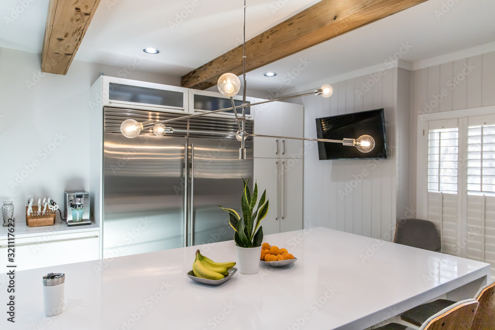 spacious large modern white kitchen recently updated with high-end ...