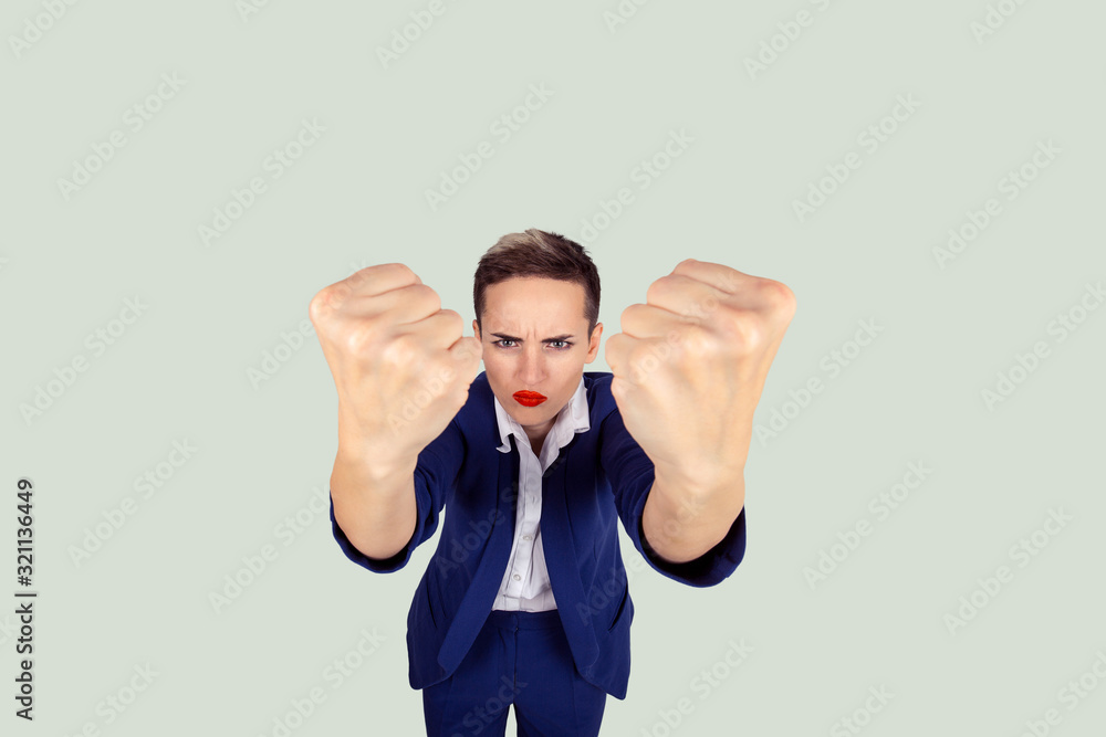 close up angry young woman showing fists about to punch hit someone to ...