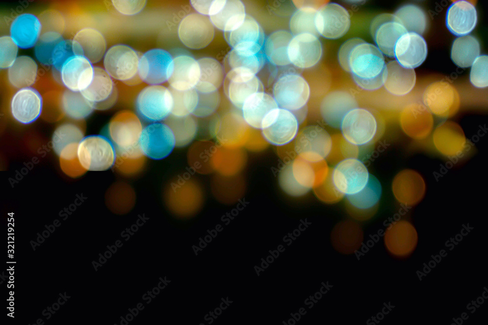 Abstract colorful bokeh and blurred reflection lighting on black ...