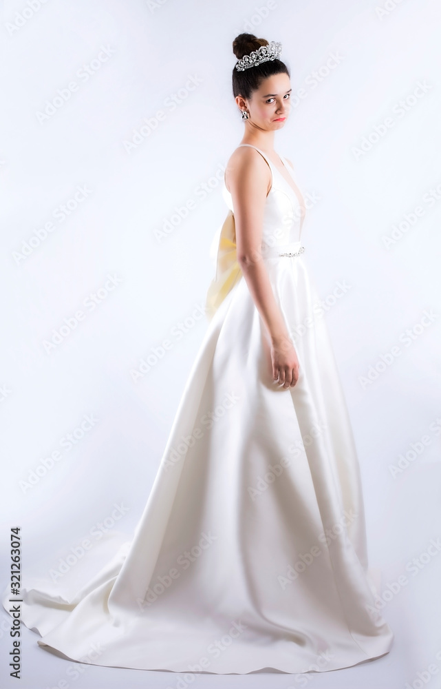 Sad bride. Isolated gray background. Grumpy bride. Sad and disappointed ...