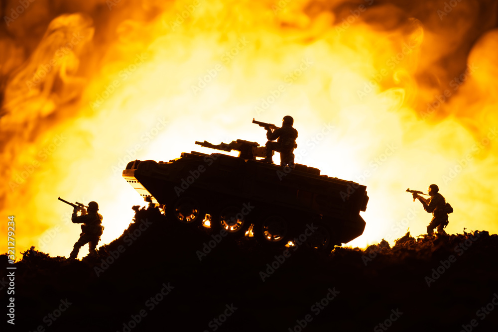 Battle scene of toy tank and soldiers with fire at background Stock ...