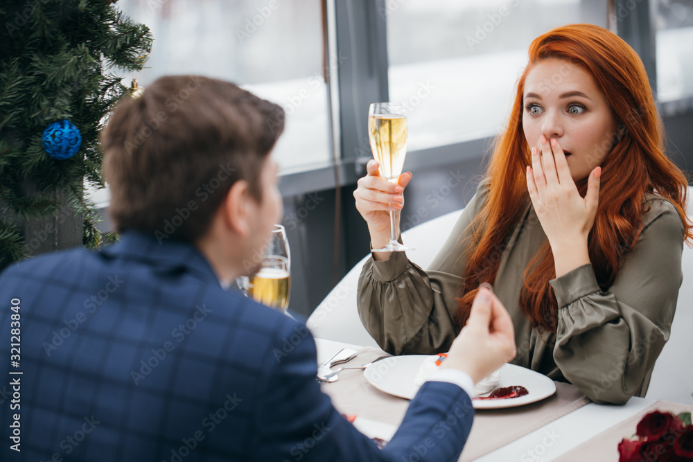 redhaired caucasian woman stay in shock after marriage proposal by his ...