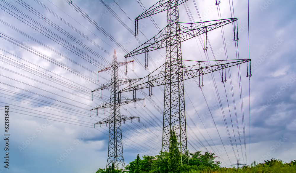 High voltage electricity pylons and transmission power lines on the ...