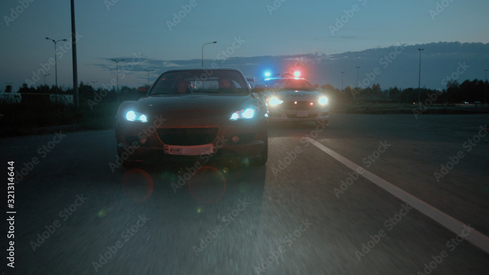 Amazing night scene. Police on duty. Side view of professional traffic ...