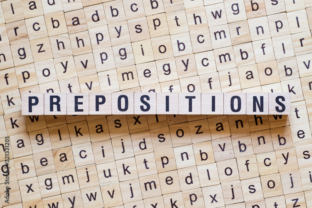 Prepositions word concept on cubes Stock Photo | Adobe Stock
