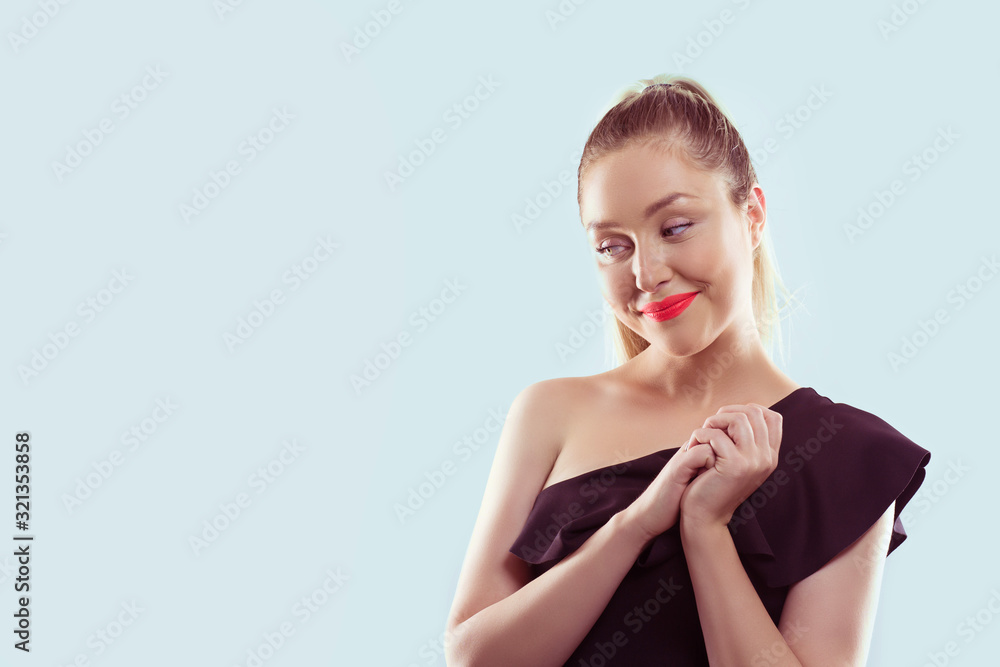 Shy. Closeup portrait young beautiful woman playing nervously with ...