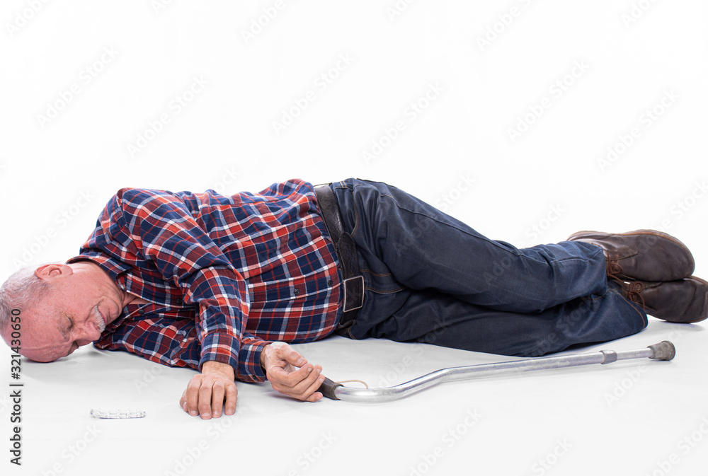 Healthcare and medicine concept. Senior man falling down from stroke or ...