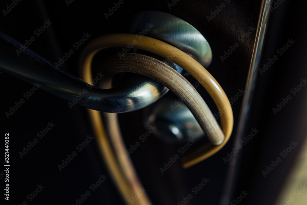 School rattan cane on door knob. Dragon rattan cane prepared for ...