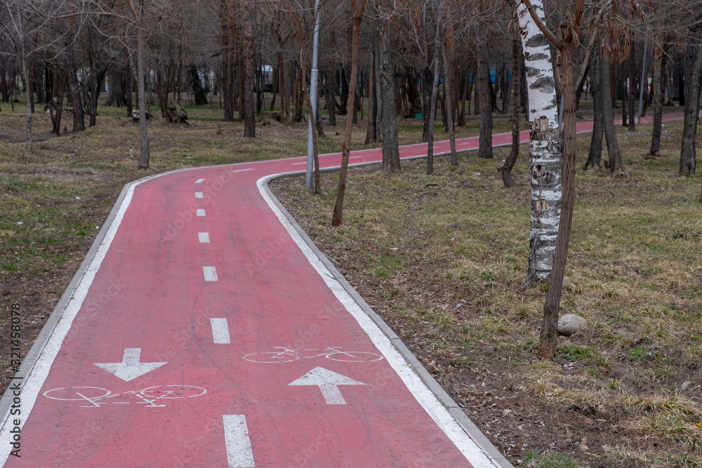 Empty red cycle lane with cycle lane sign Stock Photo | Adobe Stock