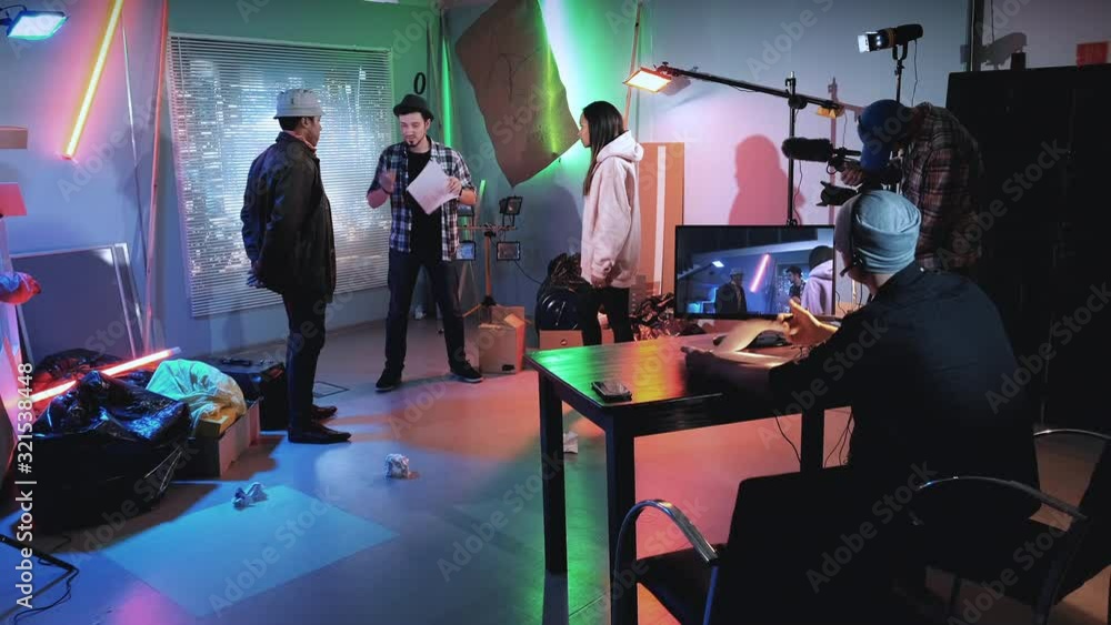 Video Stock Film shooting backstage: Film director giving instructions ...