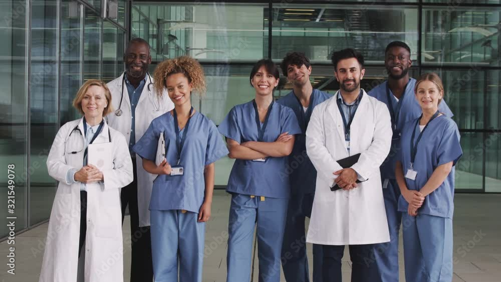 Portrait Of Medical Team Standing In Modern Hospital Building Stock ...