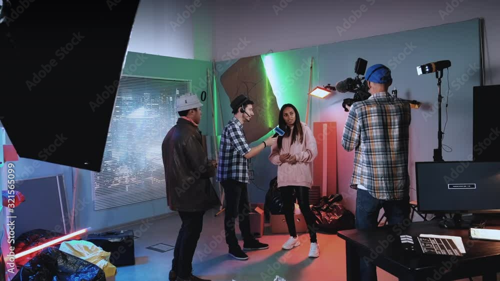 Journalist conducting interview with african actress for yellow media ...