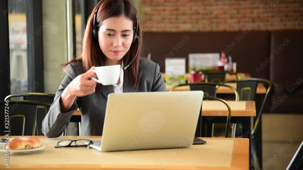 Businesswoman drinking coffee at office workplace cafeteria. Drinking ...