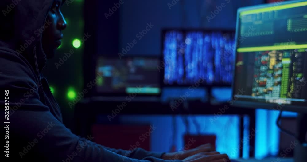 Close up of the African American young male hacker or software ...