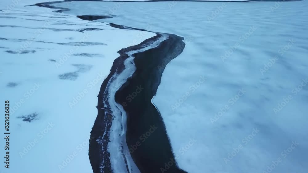 Frozen Landscape of a Icy River Found in the Snowy Mountains in ...