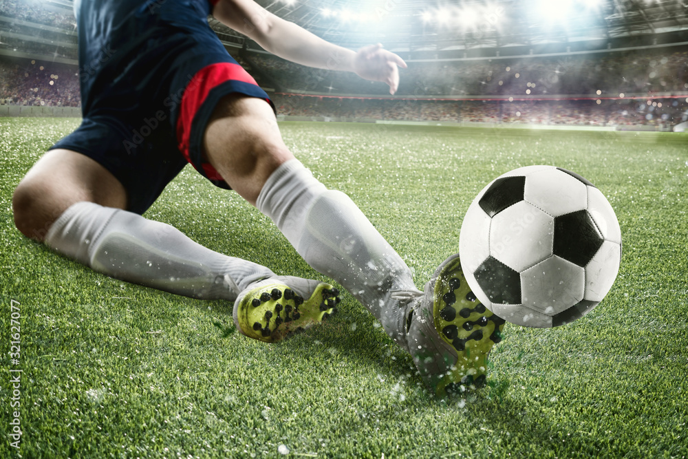 Football scene with competing football players at the stadium Stock ...