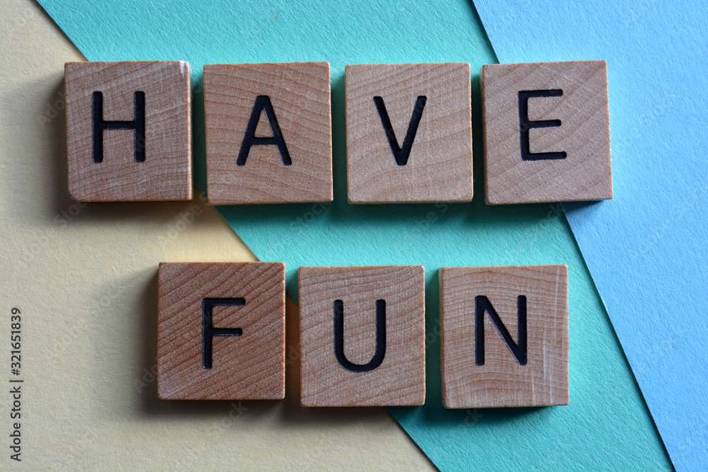 Have Fun, words in 3d wooden alphabet letters Stock Photo | Adobe Stock
