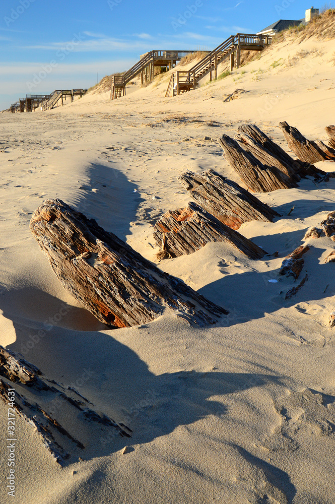 The Remains Of A 18th Century Shipwreck Pokes Through The Sands Of The
