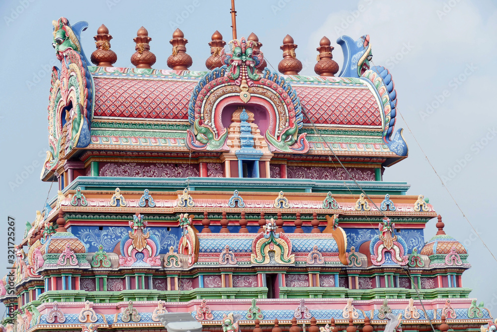Multi colored gods and goddesses adorn the gopuram Stock Photo | Adobe ...