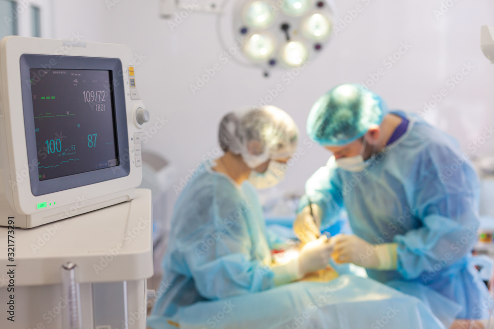 Hospital. Surgeon operates in the operating room. Monitoring of vital ...