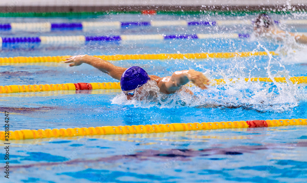 man athlete swim butterfly stroke in swimming competition Stock-Foto ...
