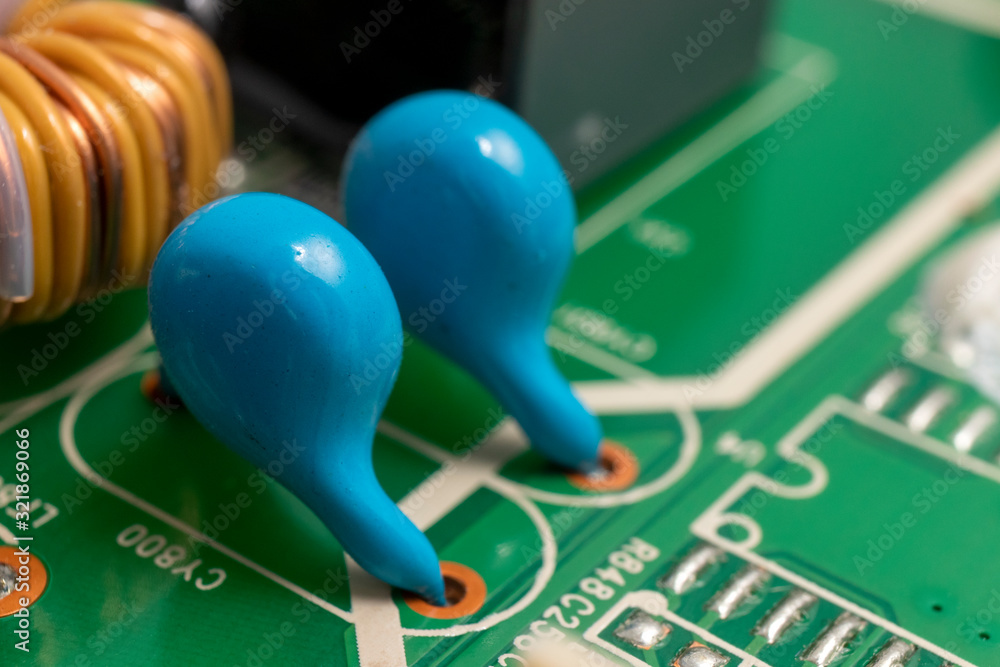 Capacitors on an LCD TV motherboard Stock Photo | Adobe Stock