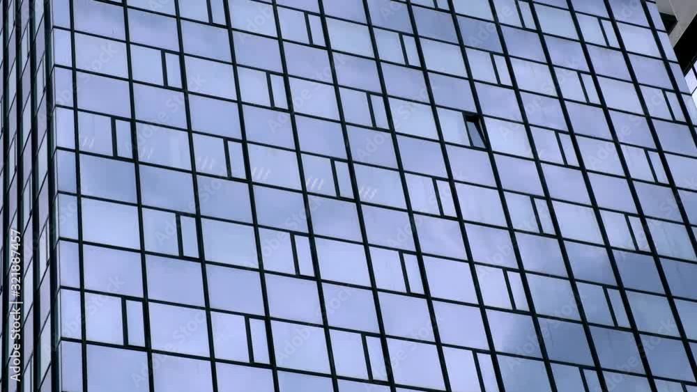 Close up footage of a modern building, the shot is moving from the ...