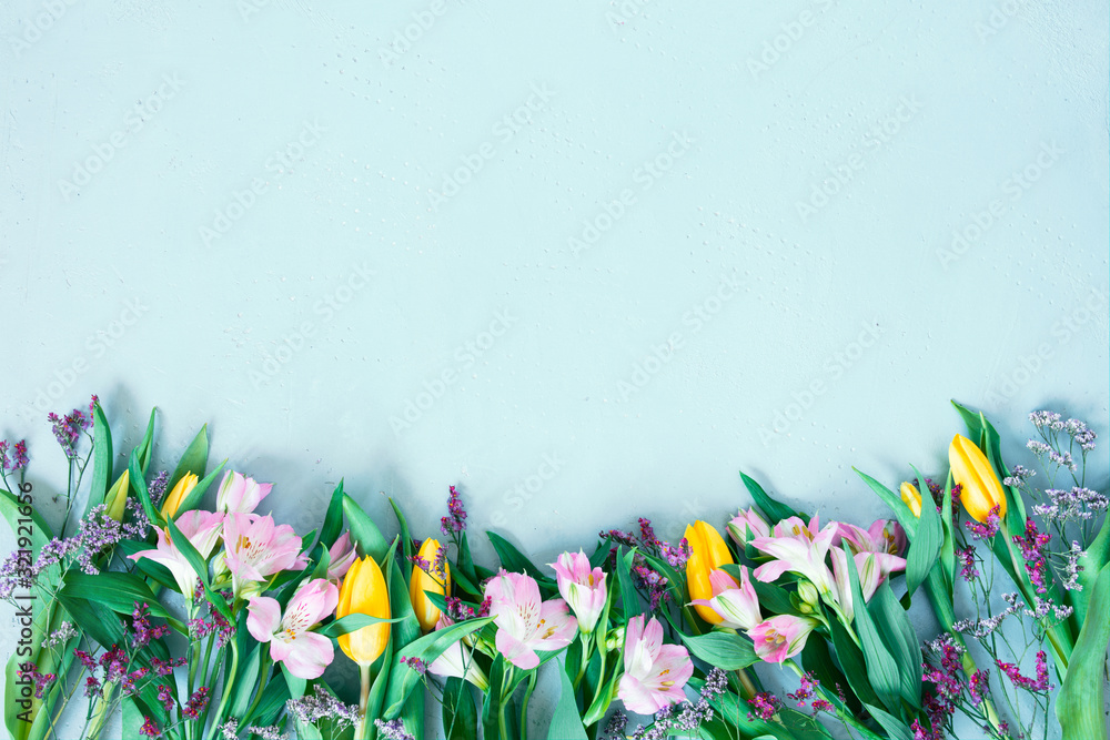 Blue background with spring flowers, festive composition for spring ...