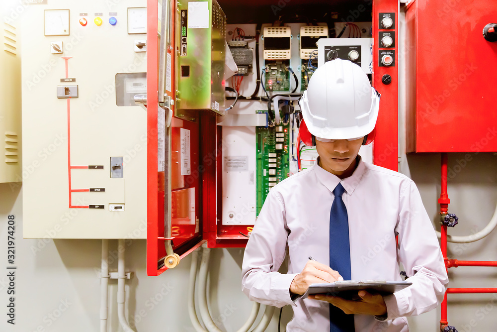 Engineer checking Industrial fire control system,Fire Alarm controller ...