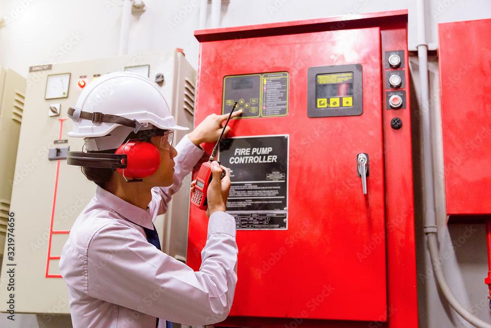 Engineer checking Industrial fire control system,Fire Alarm controller ...