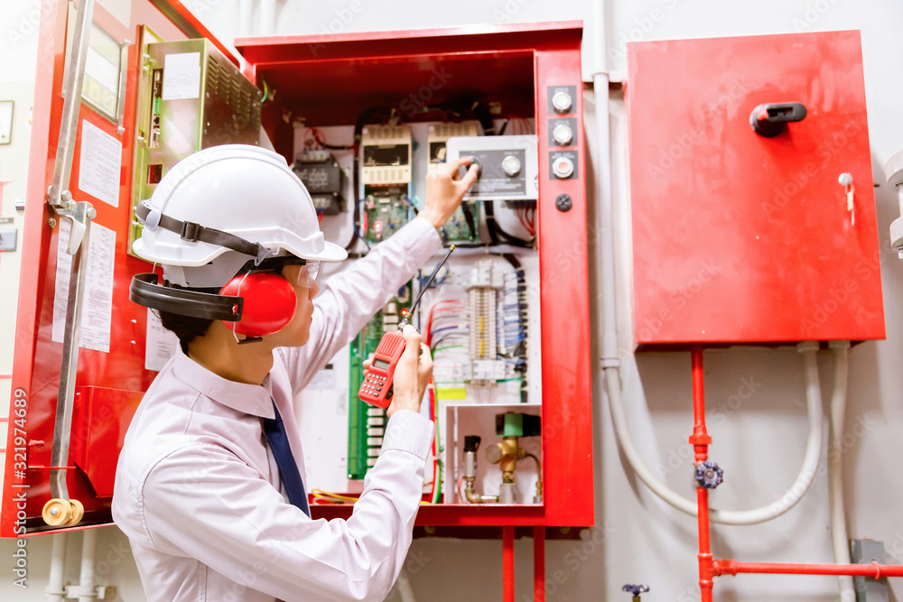 Engineer checking Industrial fire control system,Fire Alarm controller ...