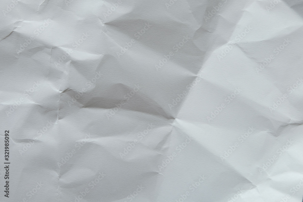 Wrinkled white blank plain paper with shade of light and shadow. Ideal ...