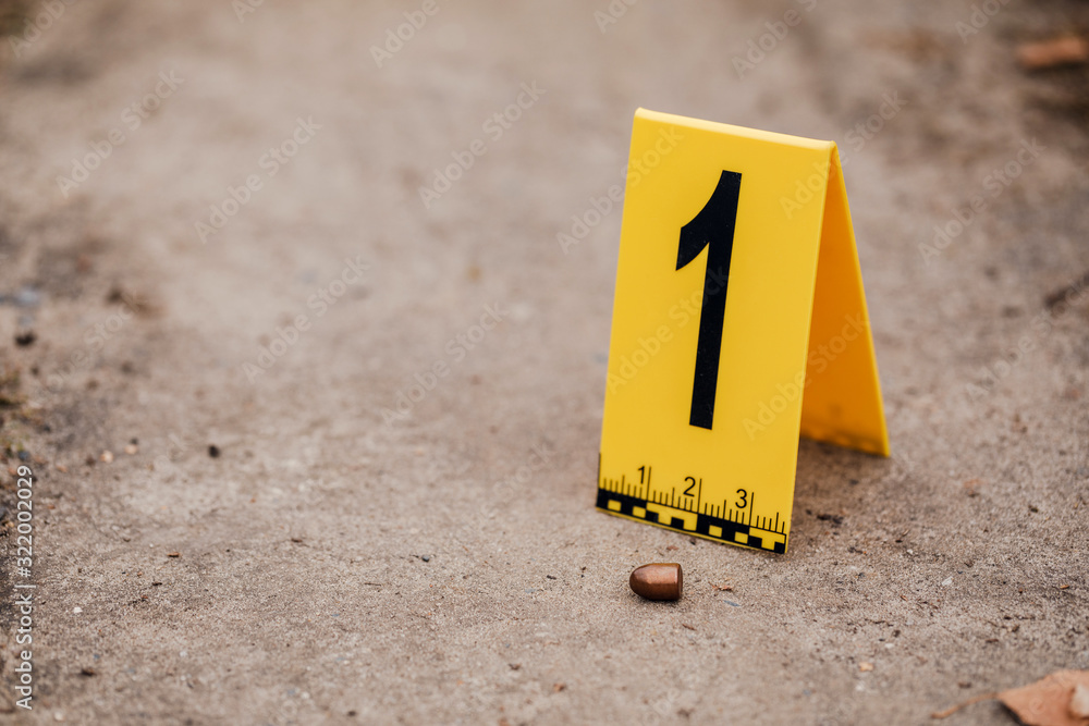 Crime scene with yellow signs. Stock Photo | Adobe Stock