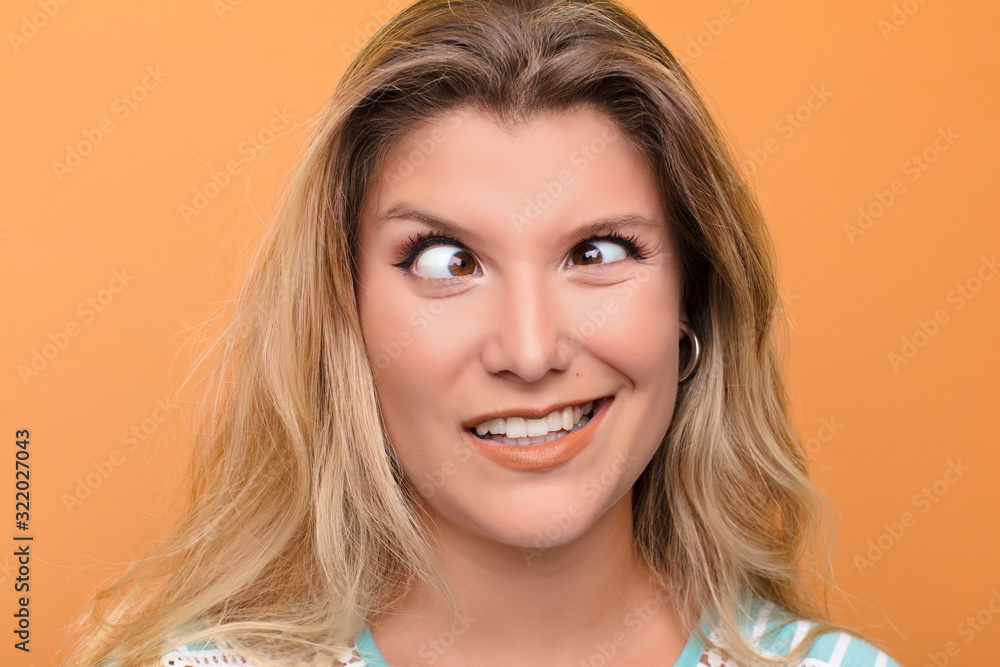 young latin woman looking goofy and funny with a silly cross-eyed ...