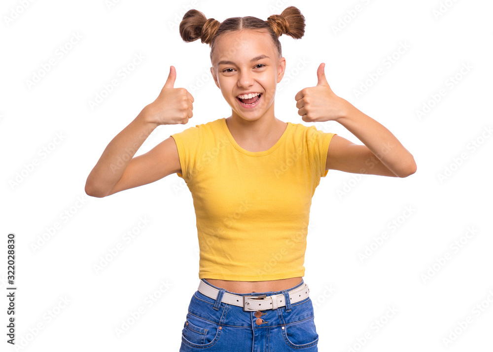 Portrait of teen girl making thumb up gesture, isolated on white ...