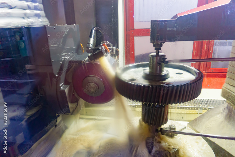 Abrasive stone produces a high-precision gear grinding of a gear wheel ...